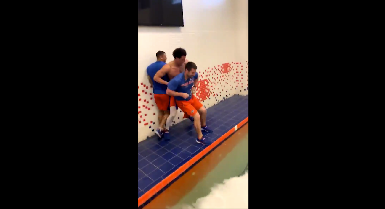 WATCH: Gators players throw strength coach Nick Savage in the cold tub ...