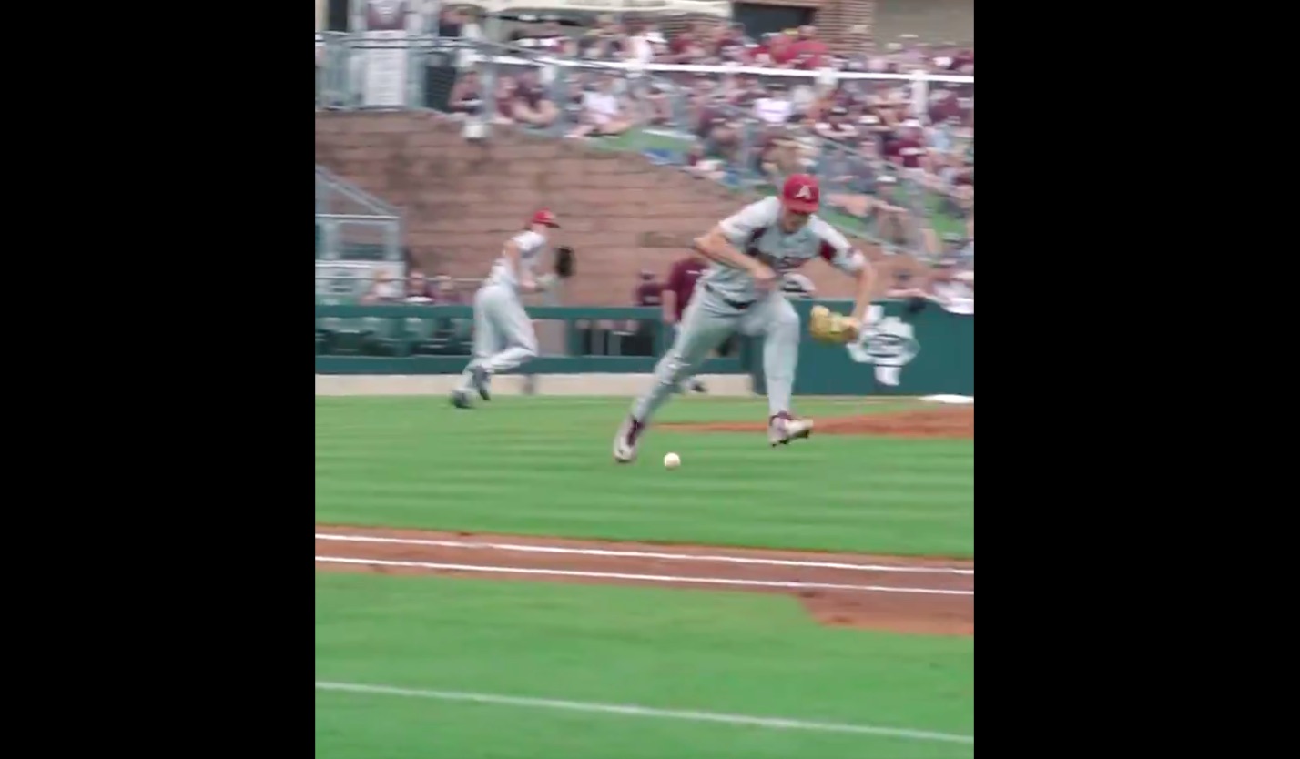 WATCH: Arkansas RHP/QB Connor Noland dives to first base to record out ...