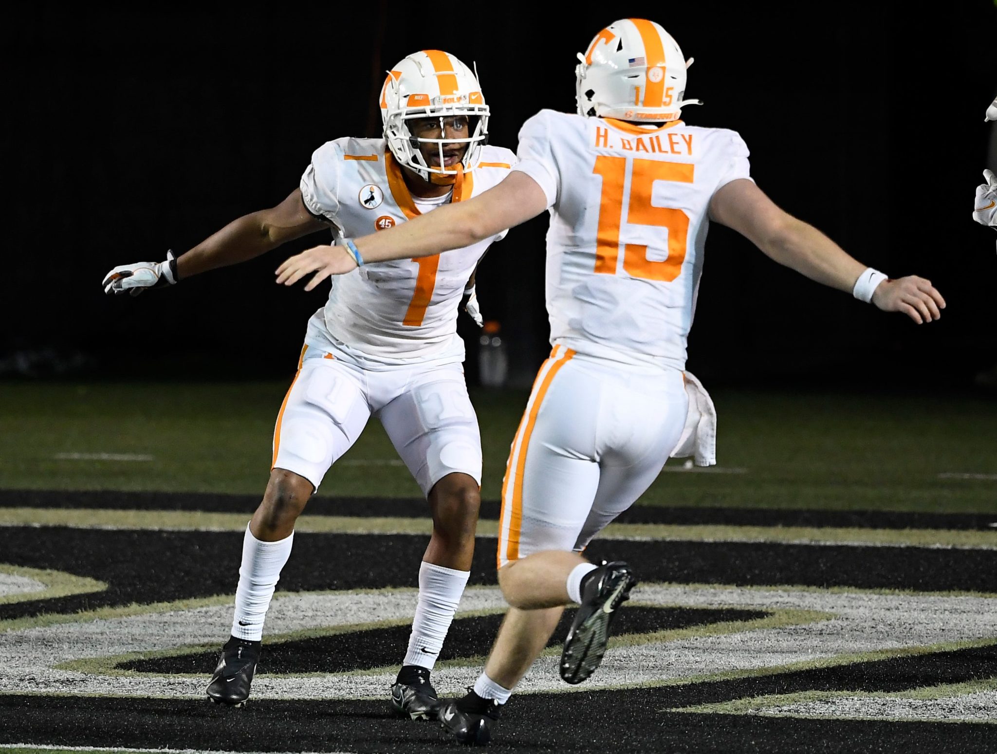 Key to Tennessee's 4-headed QB derby: Starter must be able to hit deep ...