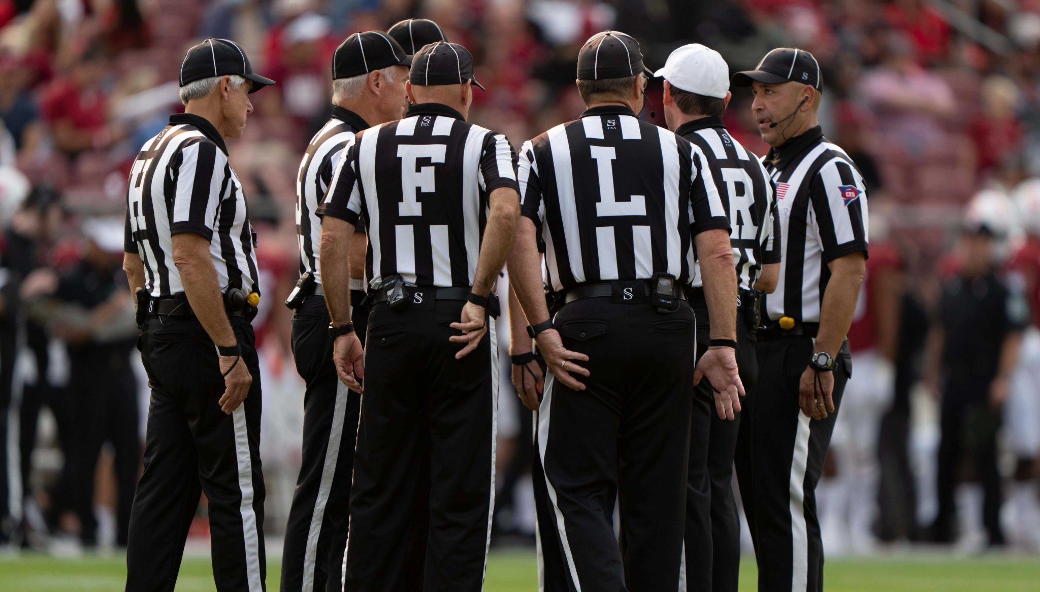 Veteran NFL referee explains how college football can address fake ...
