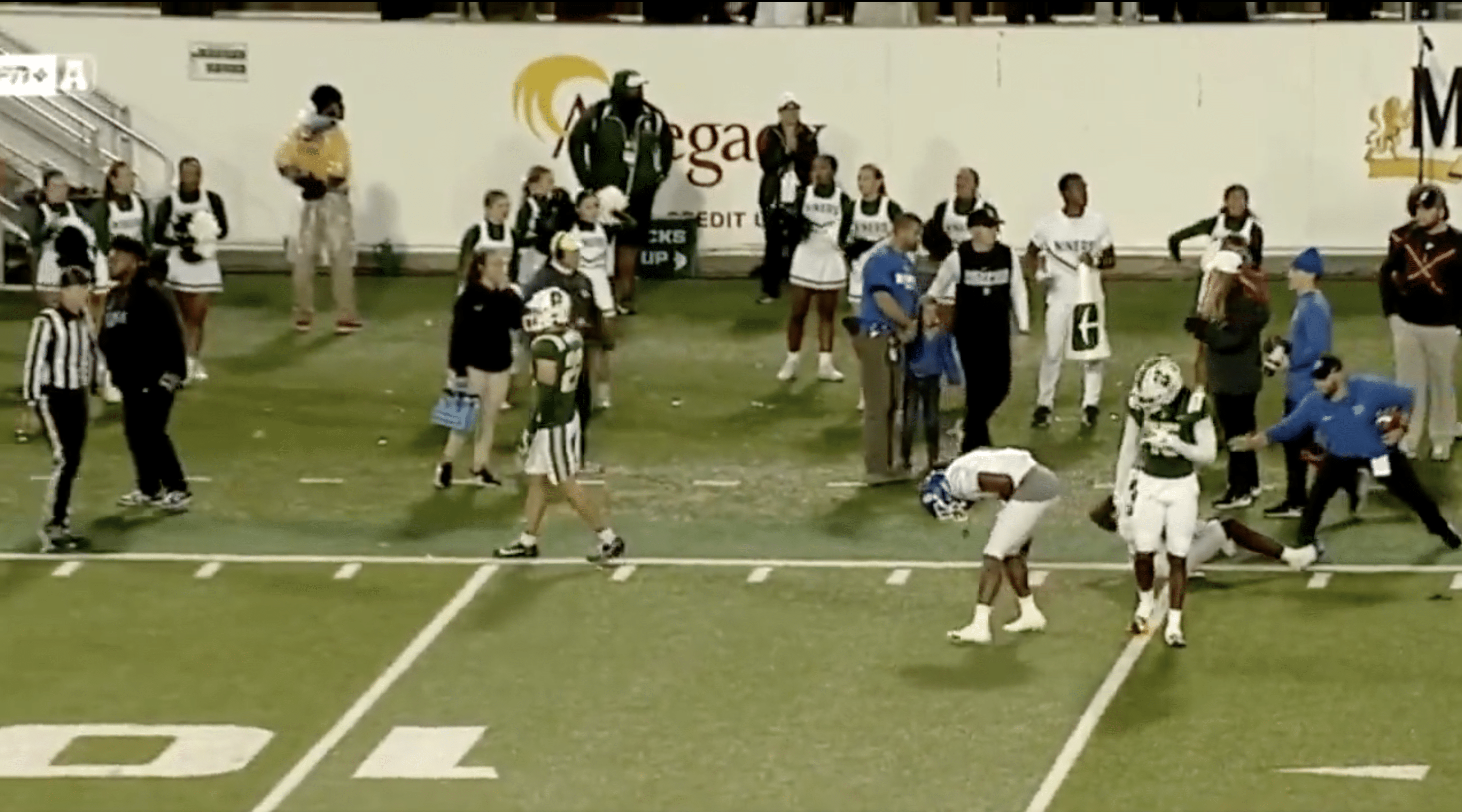 College football player gets hit with flag in very unfortunate area ...