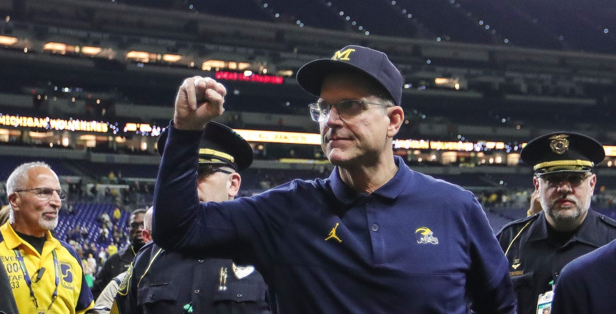 Jim Harbaugh makes first comments at Michigan airport after taking LA ...