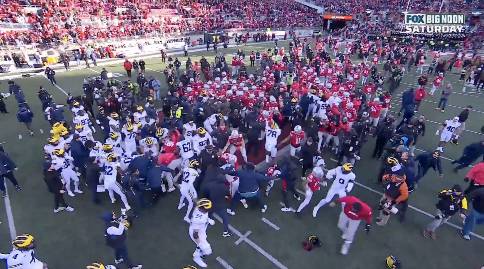 Ohio State and Michigan players brawl after Wolverines try to plant ...