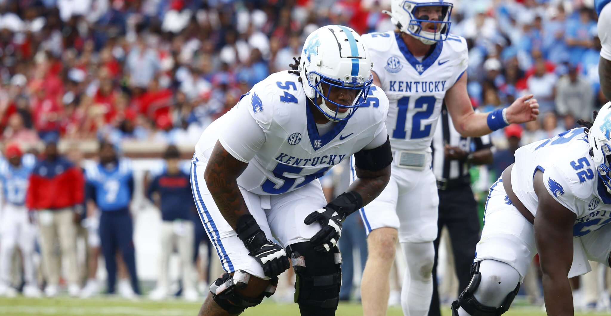 Gerald Mincey, injured Kentucky OL, seen at concession stand during UK ...