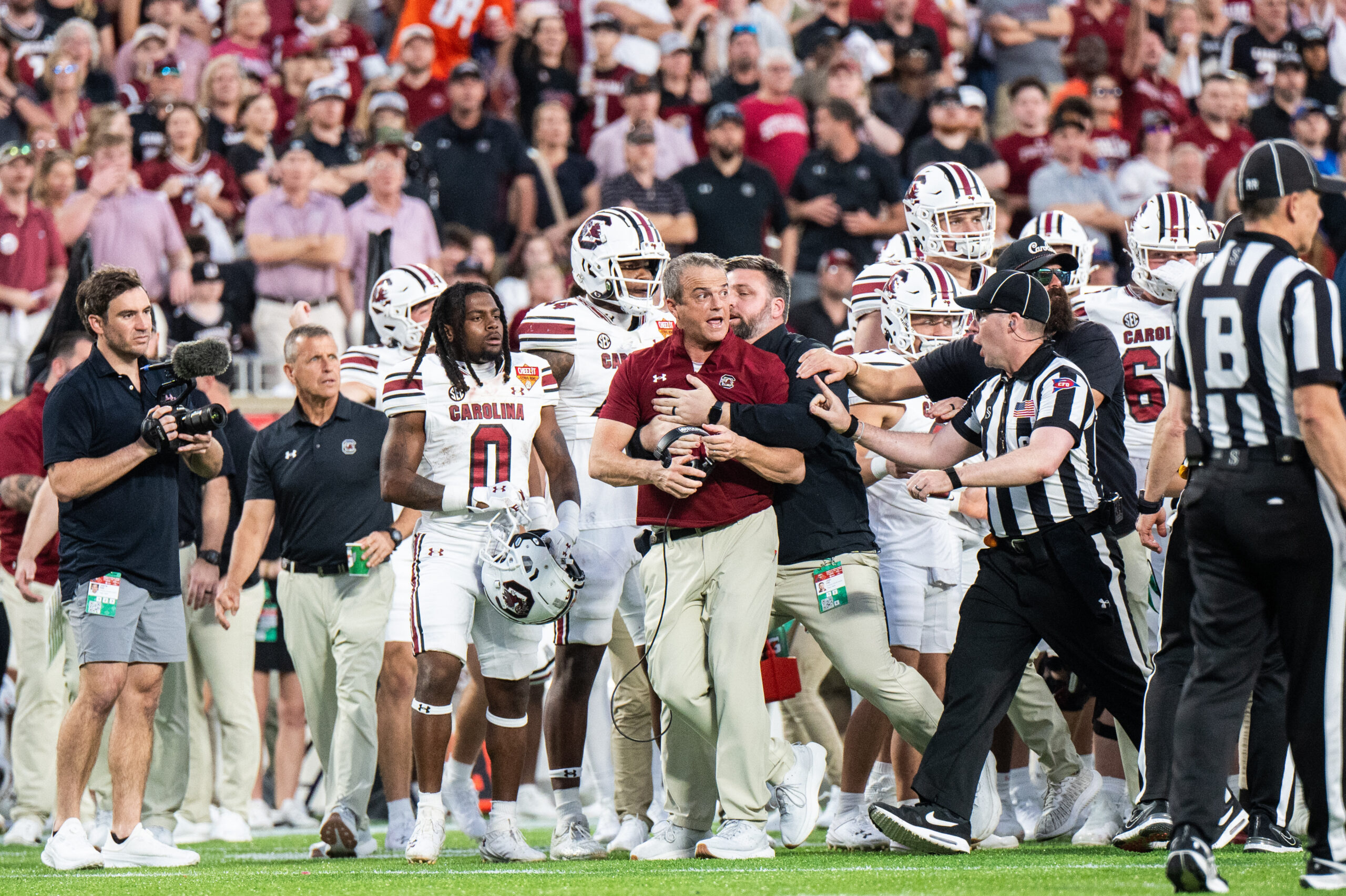 Shane Beamer, Bret Bielema dust-up in bowl game leads to rule change ...