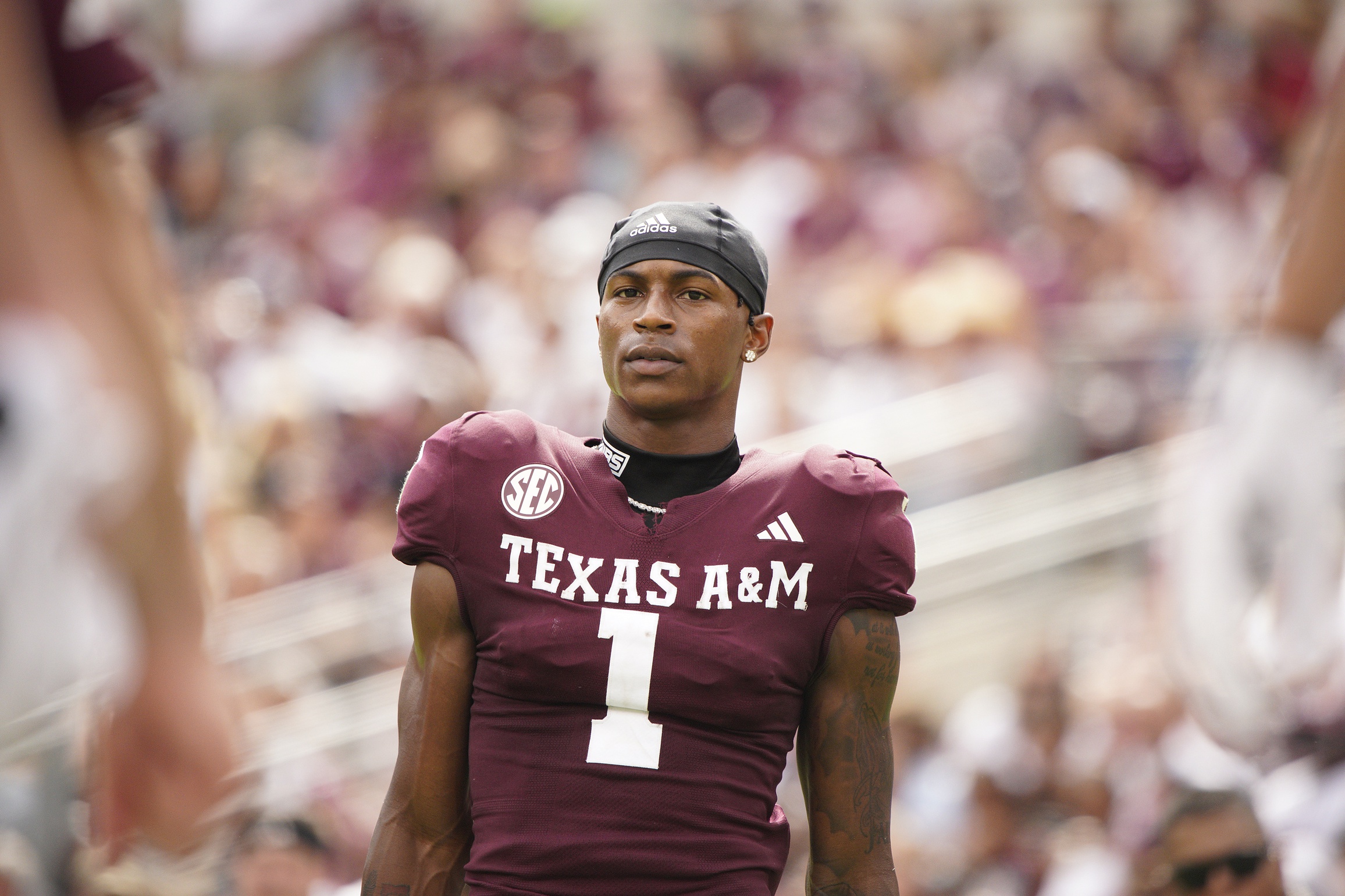 Texas A&M safety Bryce Anderson taken off field on a stretcher after ...