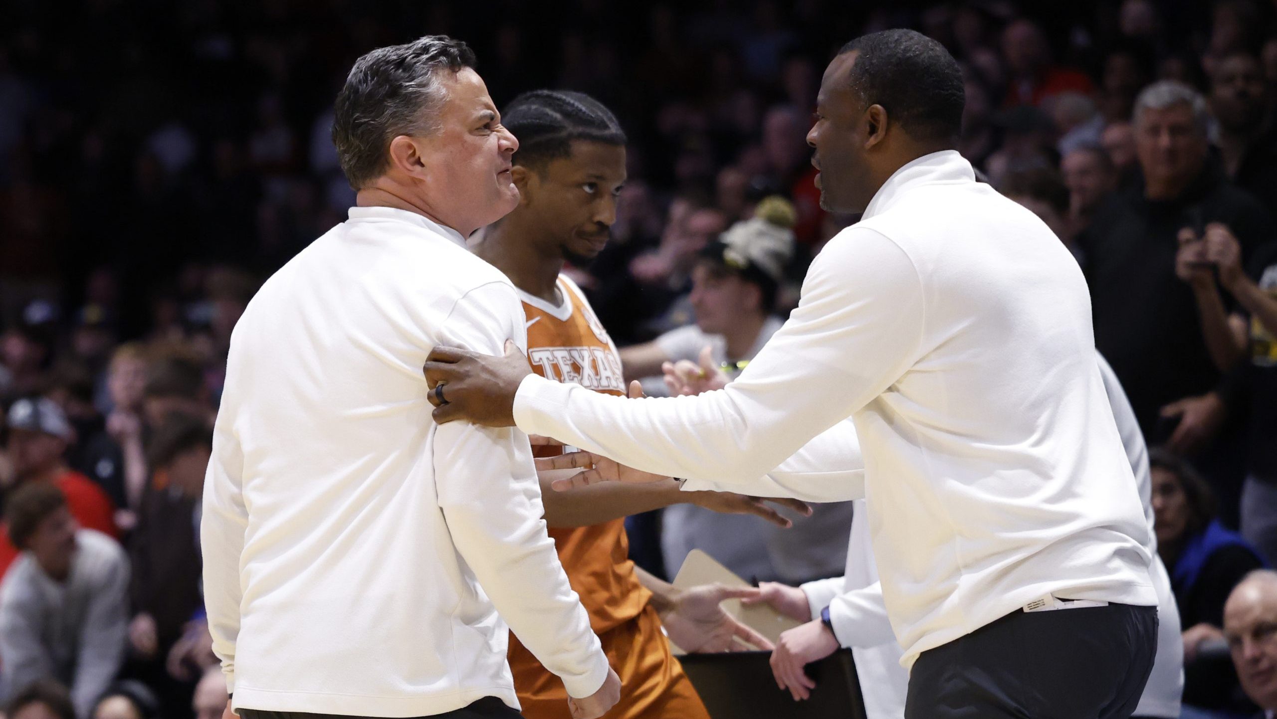 Sean Miller loses it after Texas assistant coach runs onto floor ...